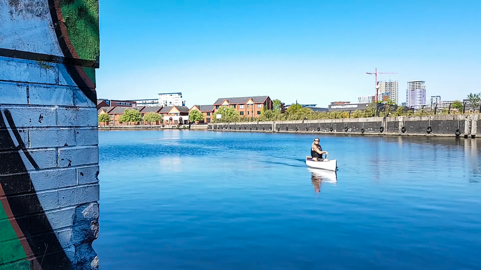 The Man giving a Historic Tour down the River Irwell... on a Canoe ...