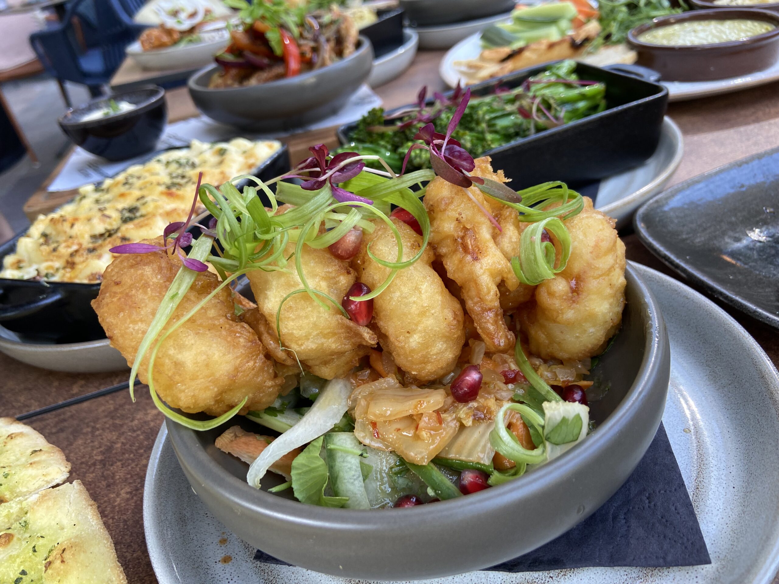 Sticky wings, crispy squid and fall-apart pork belly; new dishes launch ...